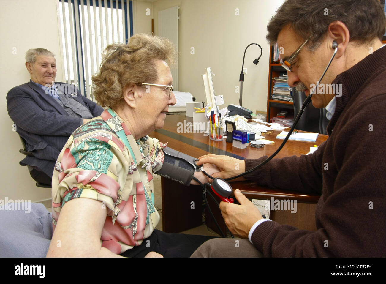 BLOOD PRESSURE, ELDERLY PERSON Stock Photo - Alamy