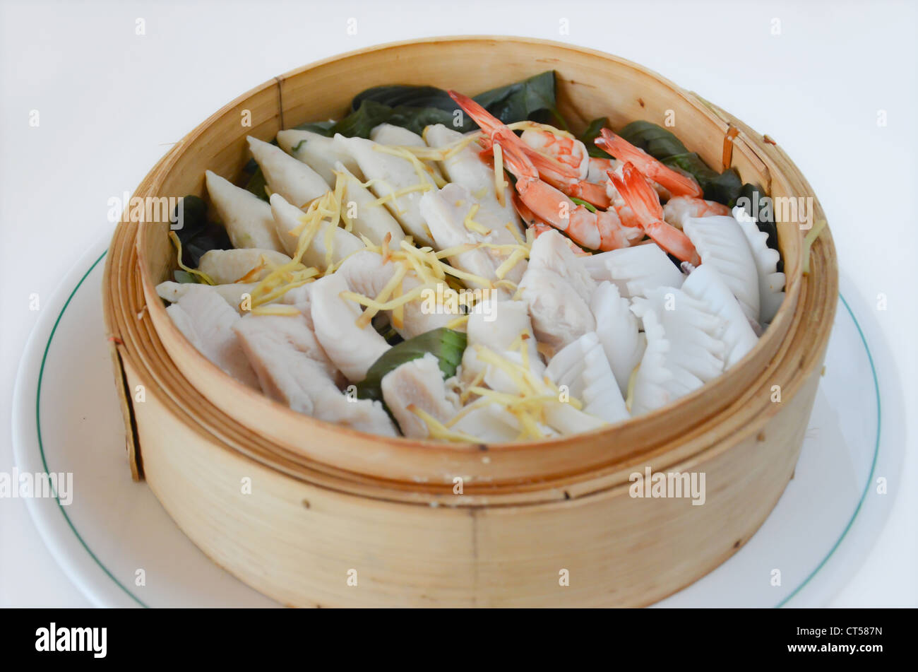 steamed mixed seafood in a bamboo basket Stock Photo - Alamy