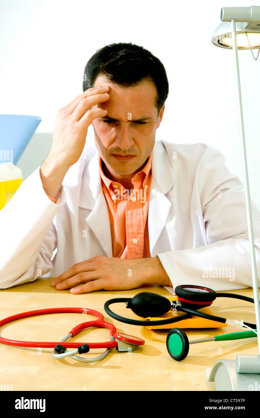 Tired stressed healthcare worker hi-res stock photography and images ...