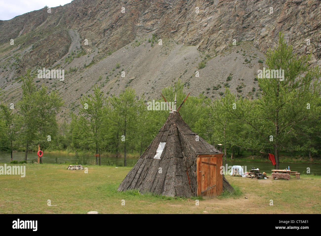 Traditional wooden teepee at riverside, River Chulyshman Valley, Altai ...