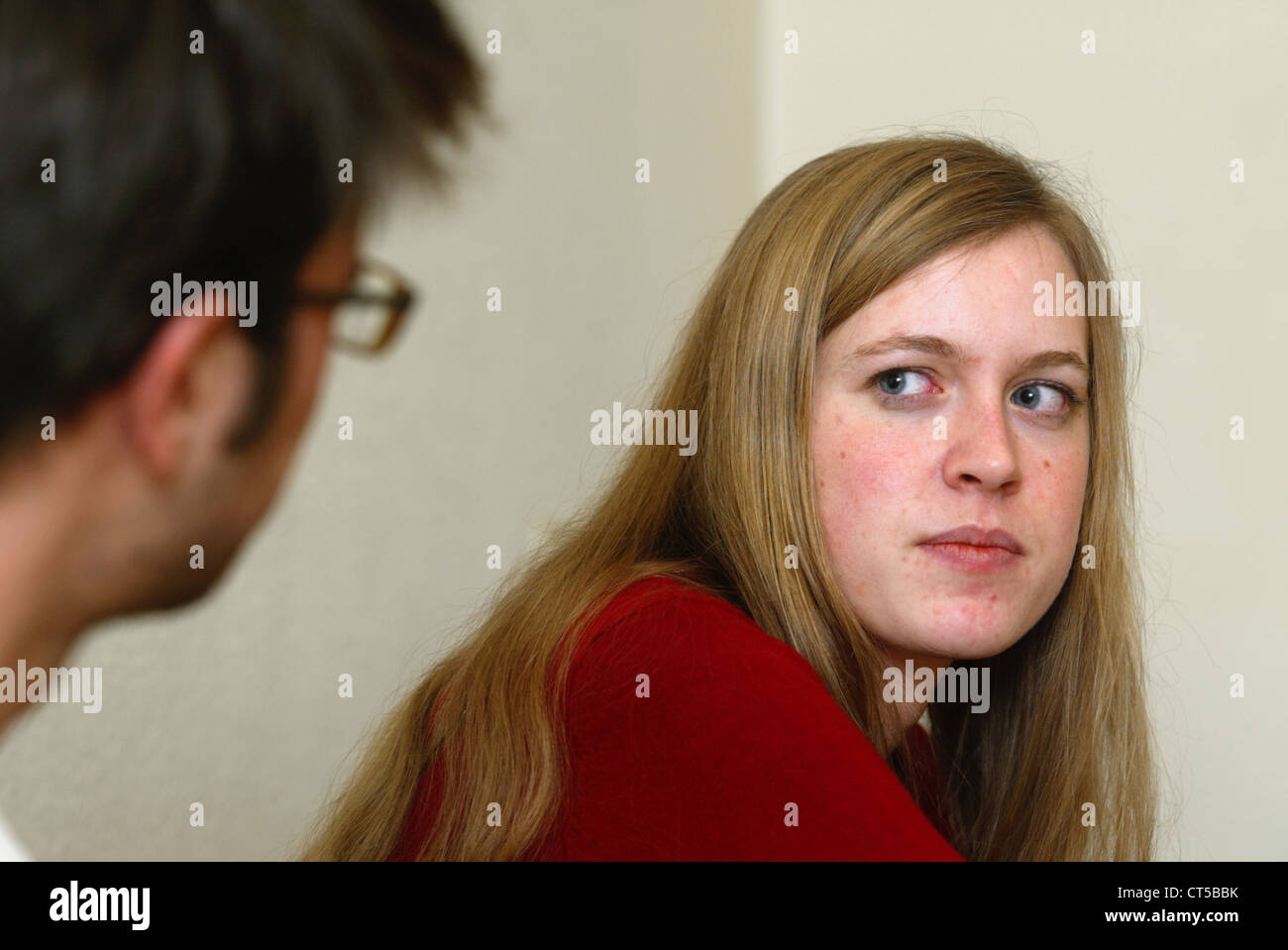 Student apartment, Miriam and Alex are talking in the kitchen Stock ...