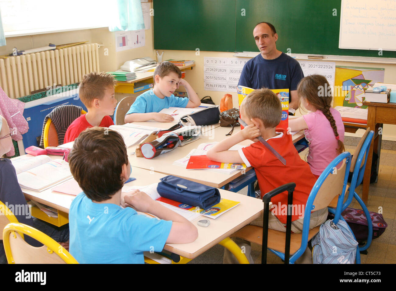 CHILD AT SCHOOL Stock Photo - Alamy