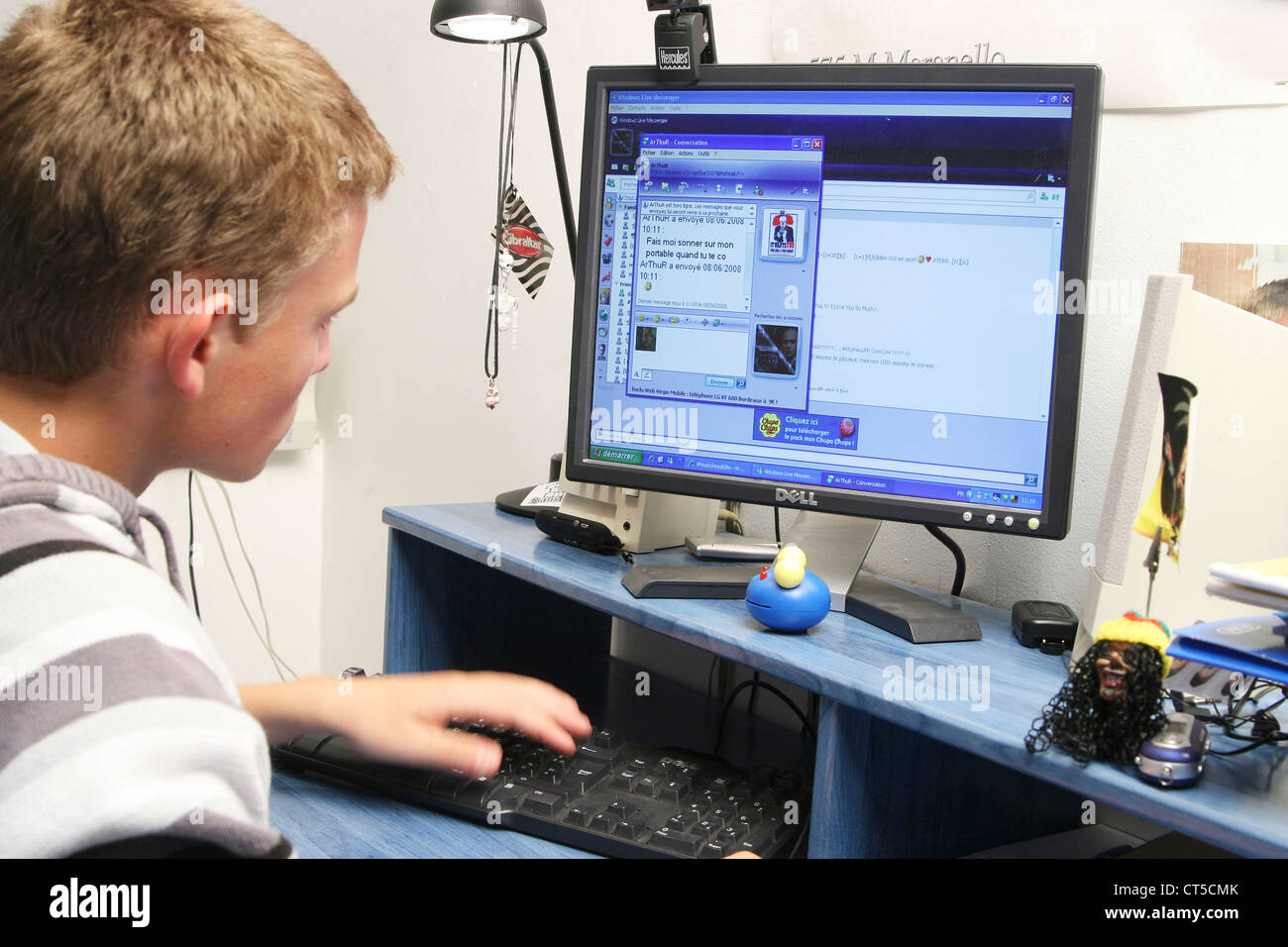 TEENAGER AT A COMPUTER Stock Photo - Alamy