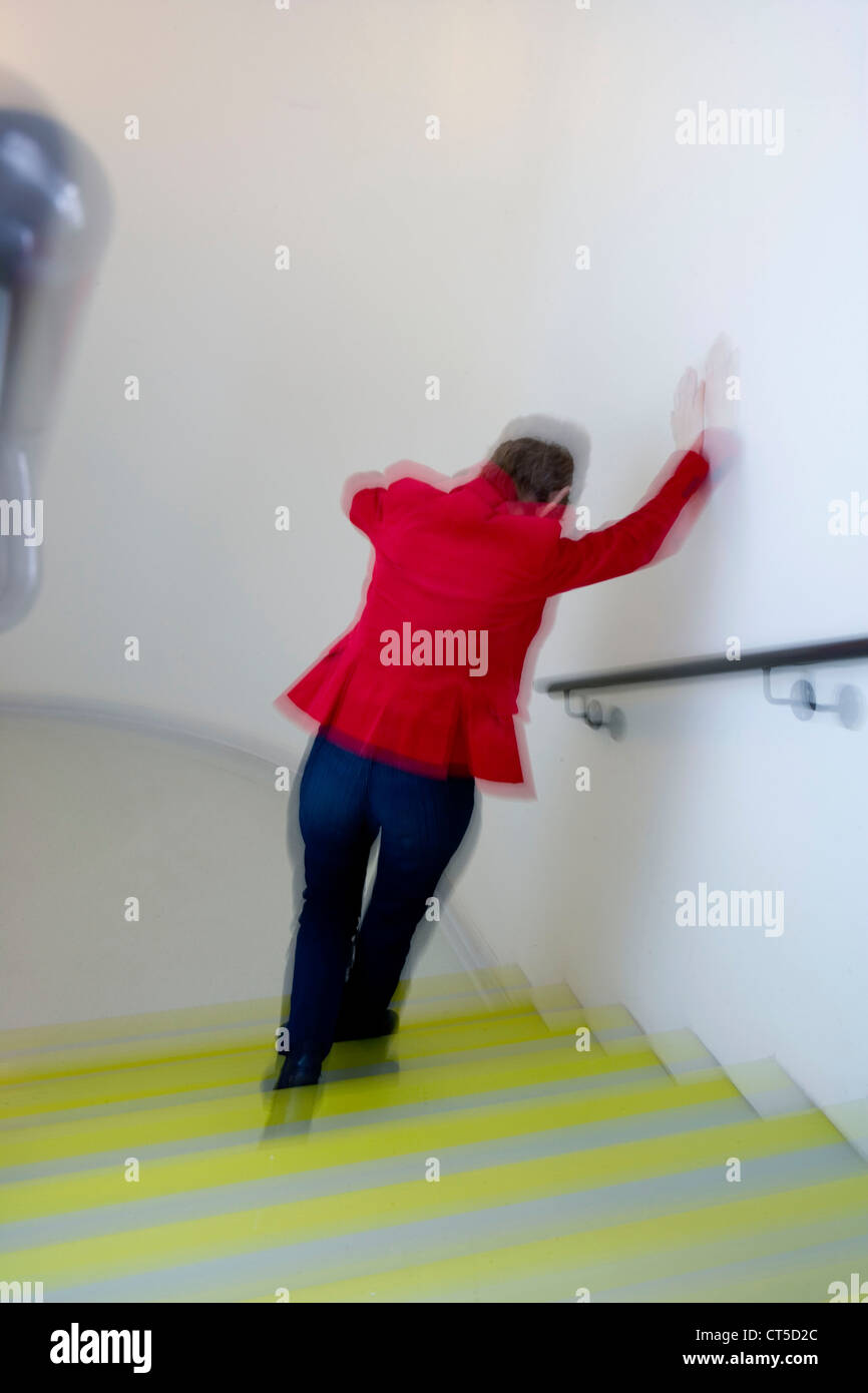 WOMAN WITH VERTIGO Stock Photo - Alamy