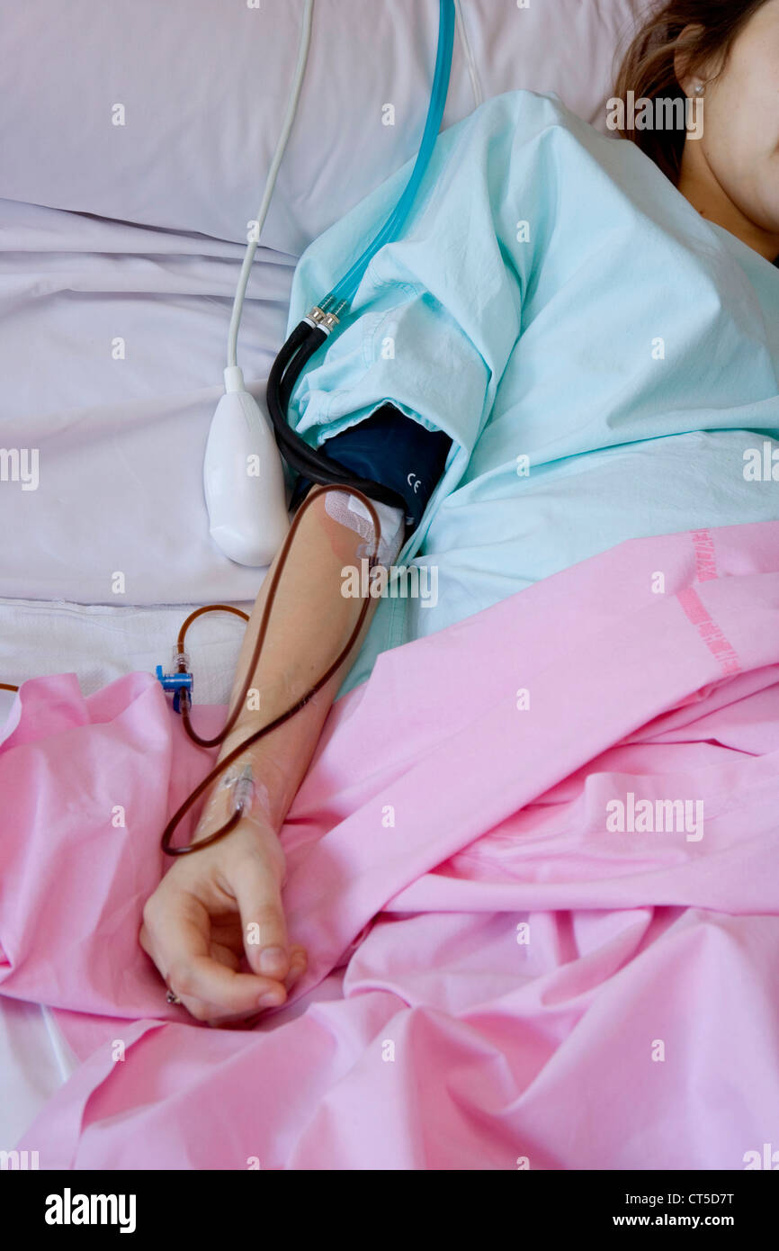 PREGNANT WOMAN WITH A DRIP Stock Photo - Alamy