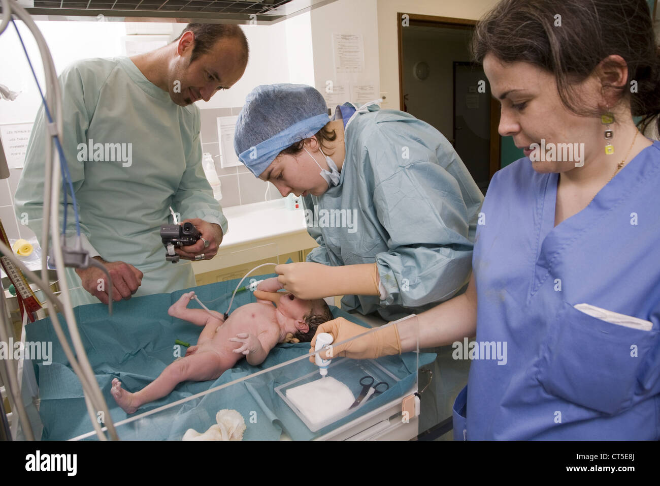 Newborn suction hi-res stock photography and images - Alamy