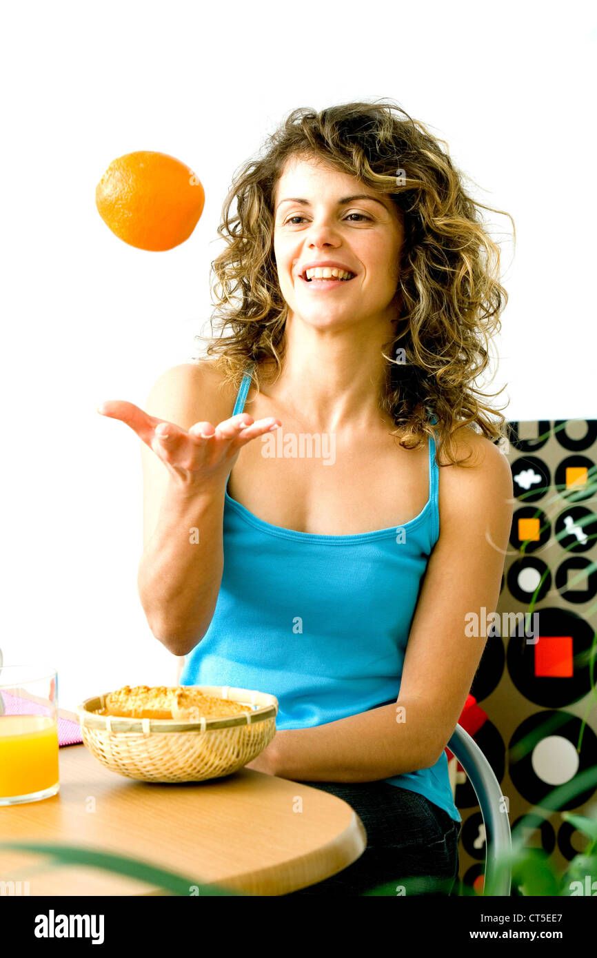 WOMAN EATING BREAKFAST Stock Photo - Alamy