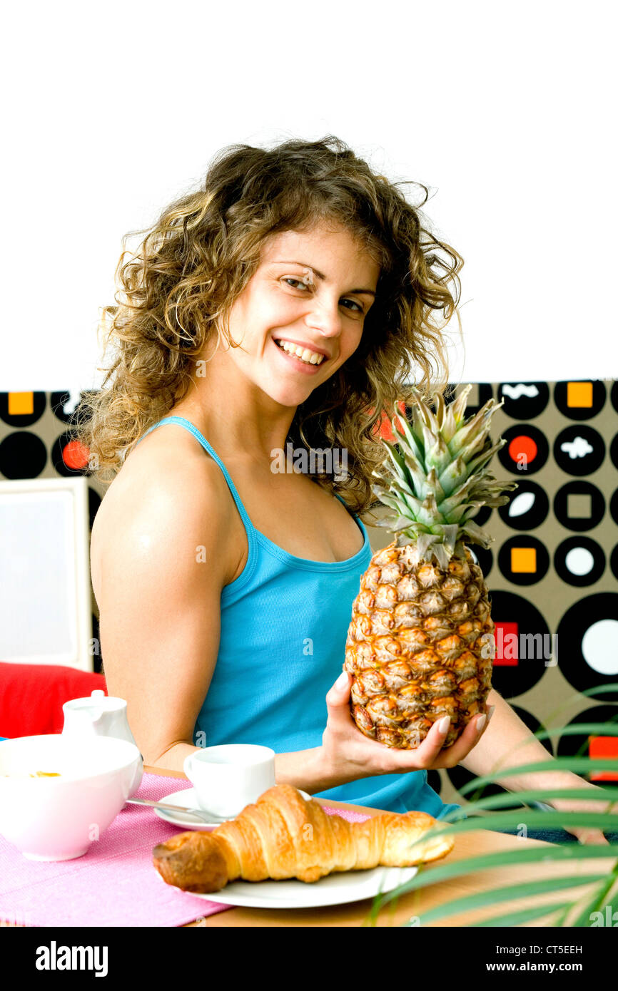 WOMAN EATING FRUIT Stock Photo - Alamy