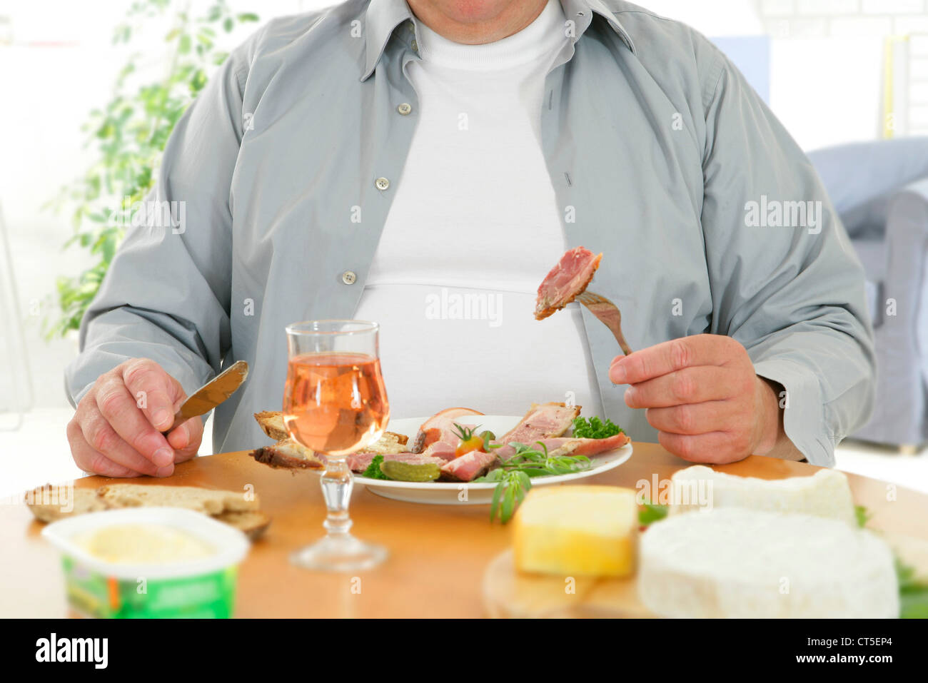 Elderly eating pork meat hi-res stock photography and images - Alamy