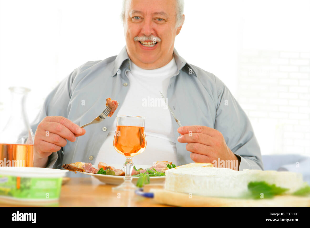ELDERLY PEOPLE EATING A MEAL Stock Photo - Alamy