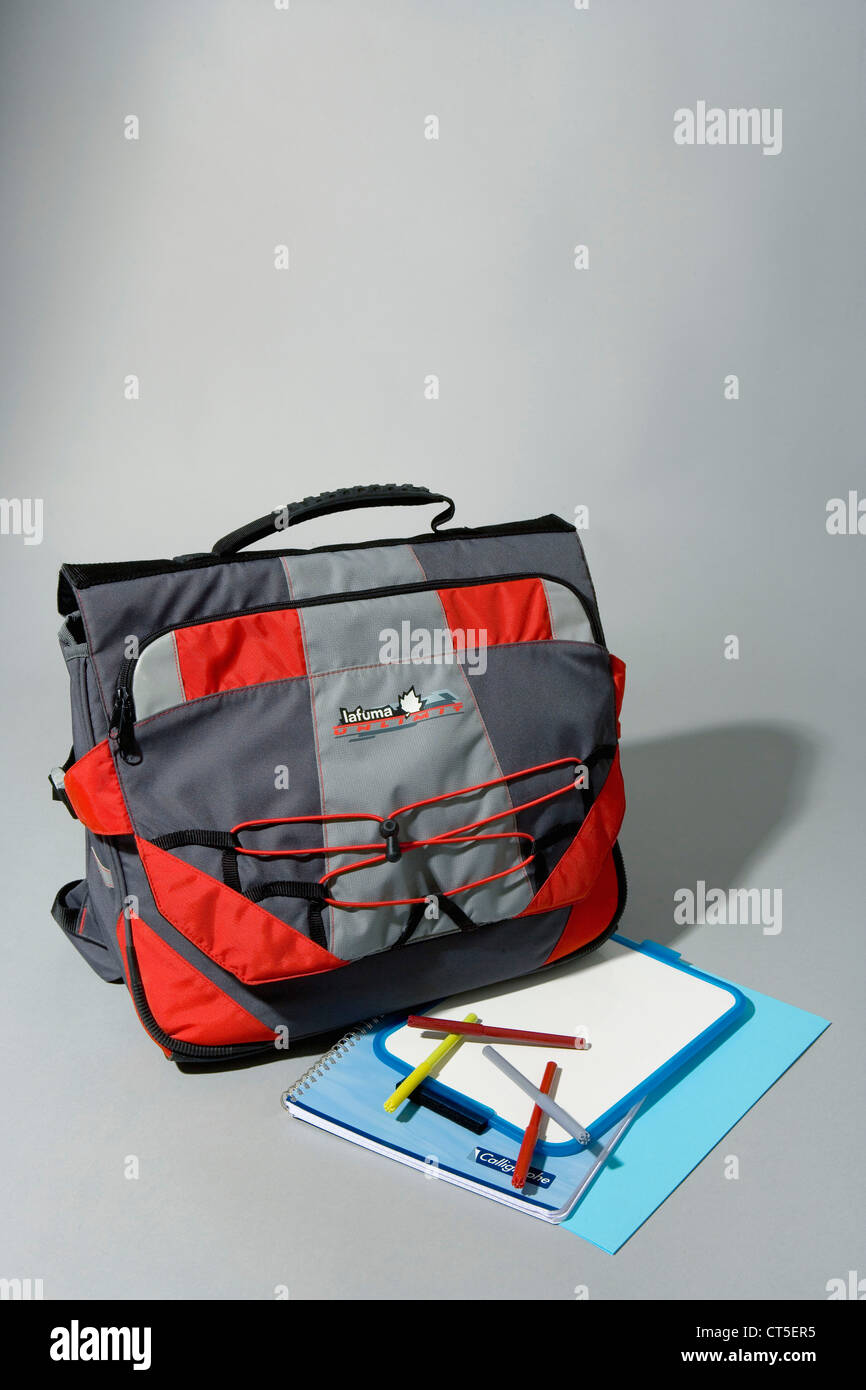 Boy with school supplies hi-res stock photography and images - Alamy