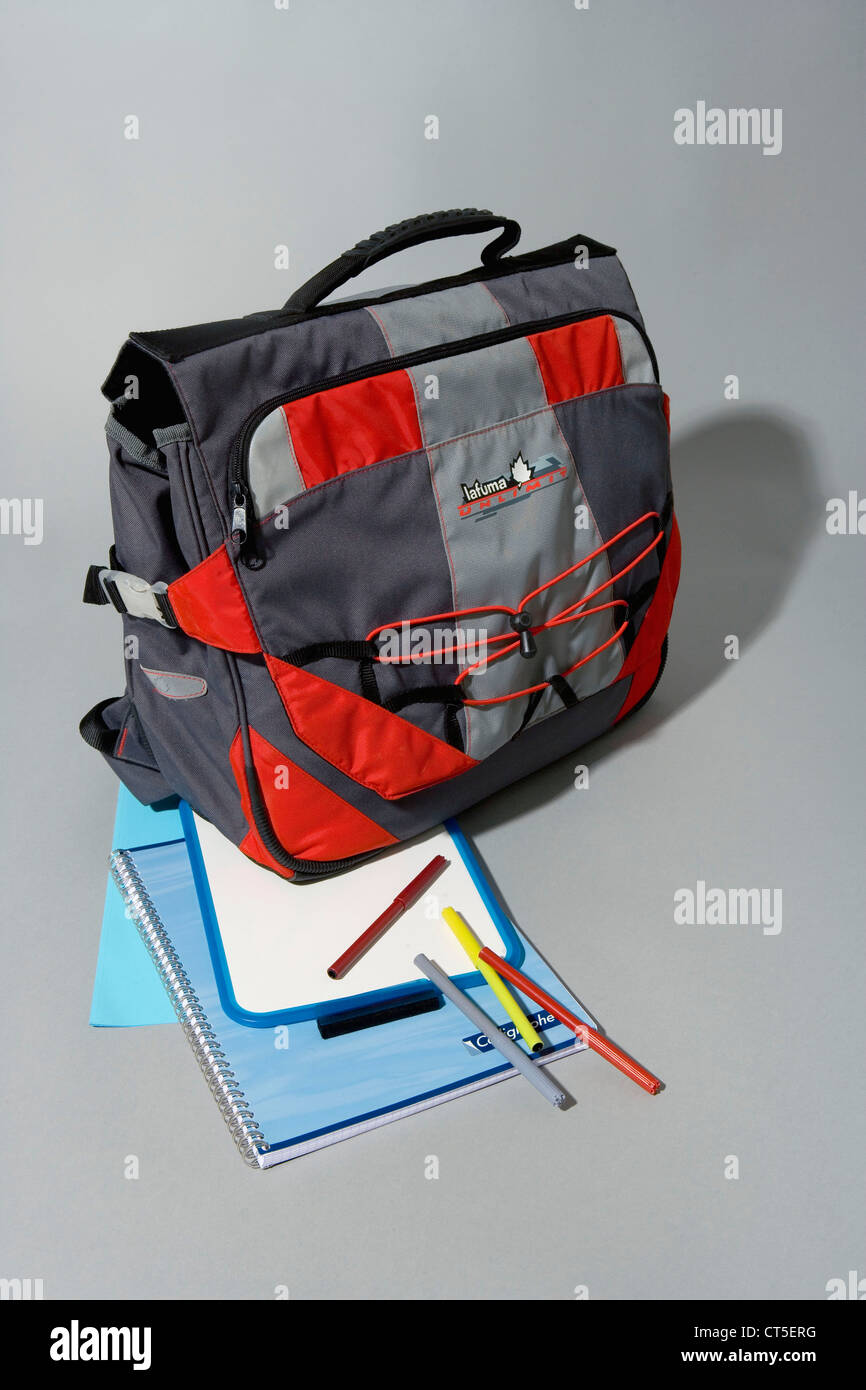 Boy with school supplies hi-res stock photography and images - Alamy