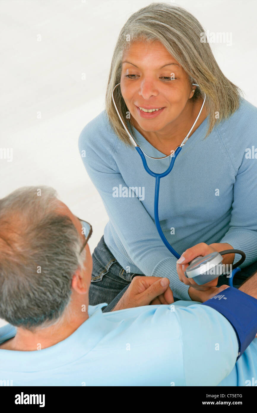 BLOOD PRESSURE, ELDERLY PERSON Stock Photo - Alamy