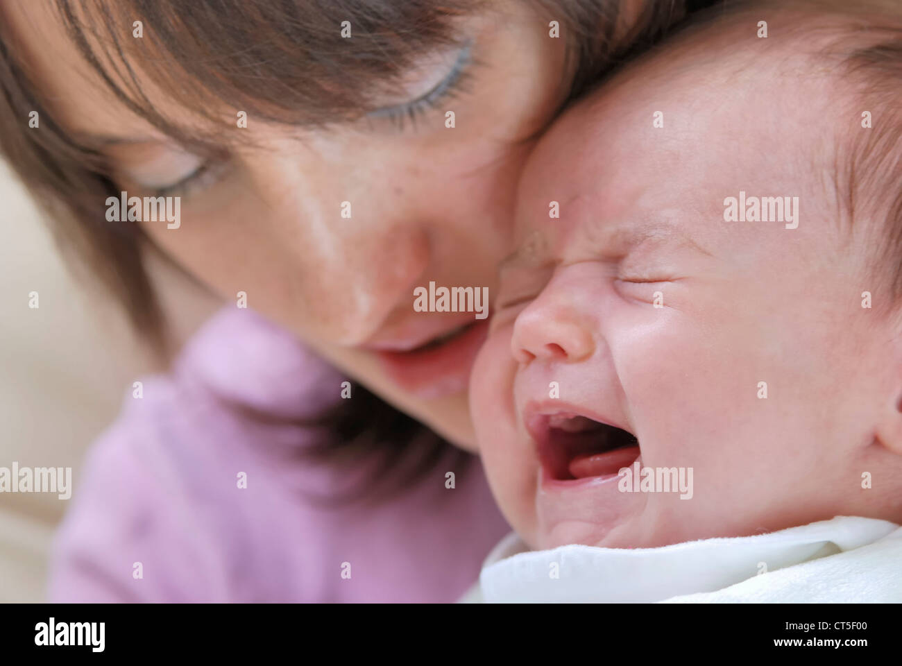 Crying baby face hi-res stock photography and images - Alamy