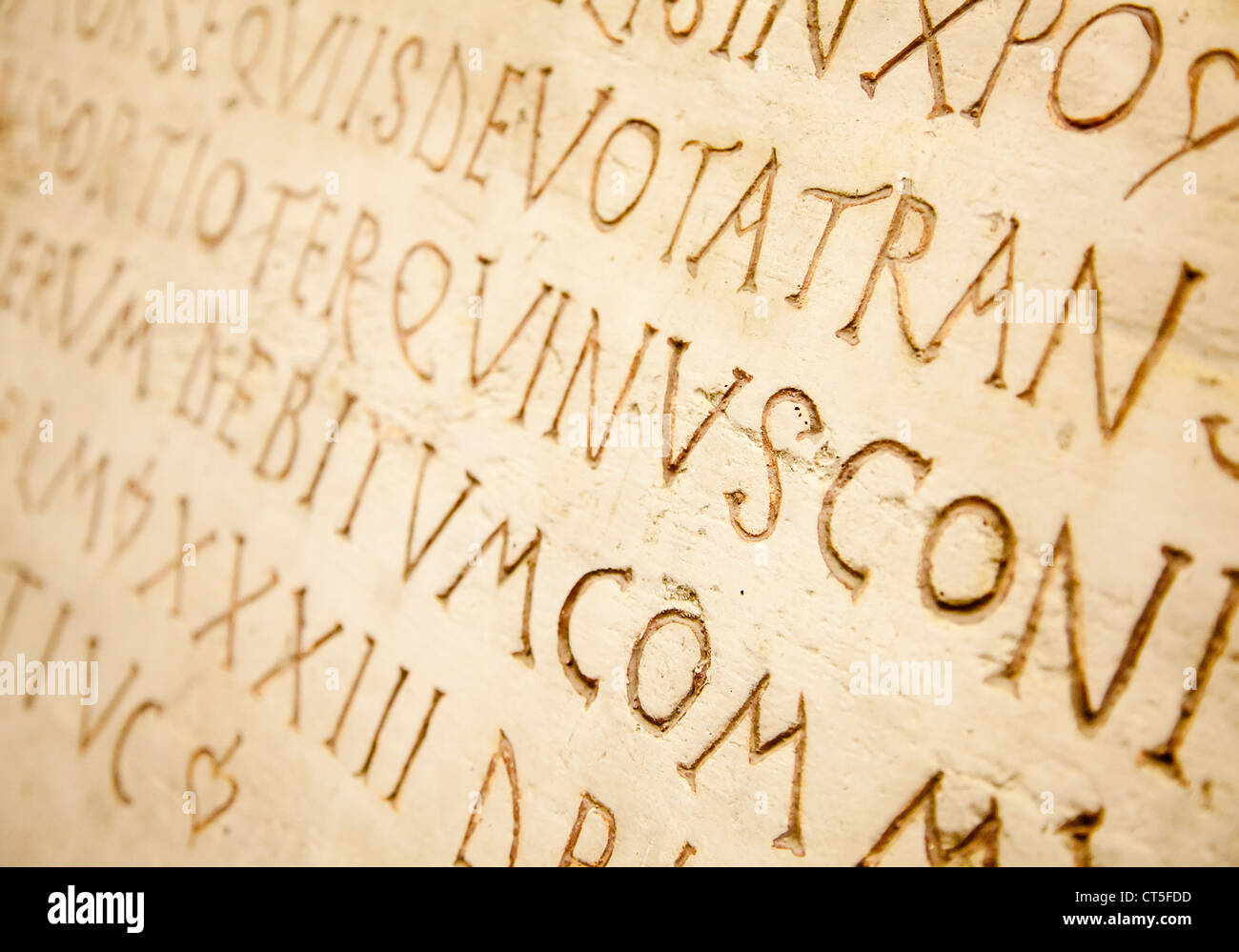 Pre-christian latin writing carved on the tombstone Stock Photo - Alamy