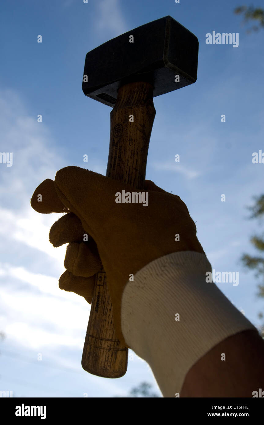 Human hammer hi-res stock photography and images - Alamy