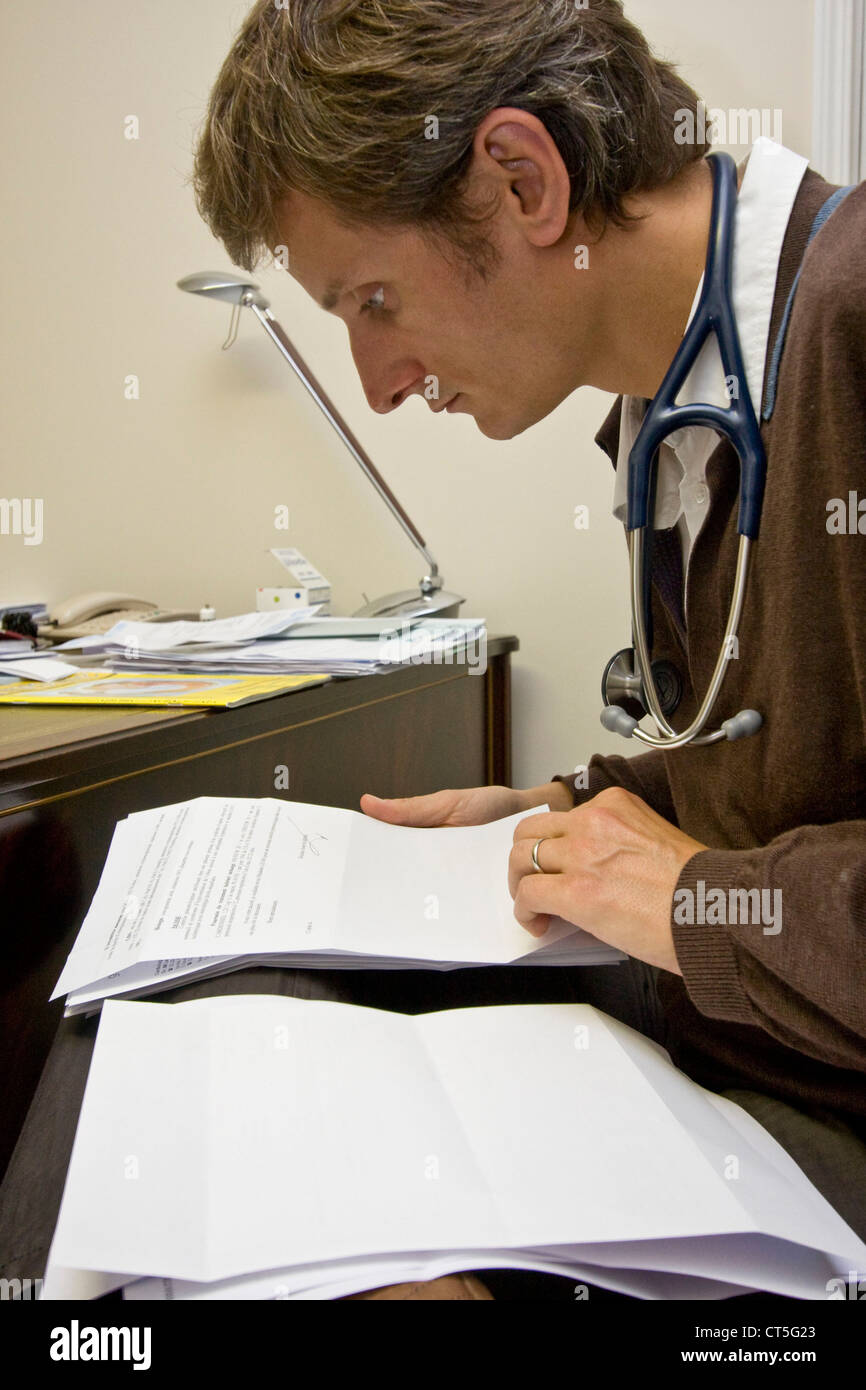 Doctor surgery office records file hi-res stock photography and images ...