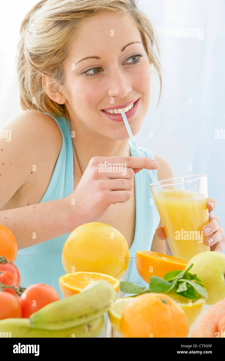 WOMAN WITH COLD DRINK Stock Photo - Alamy