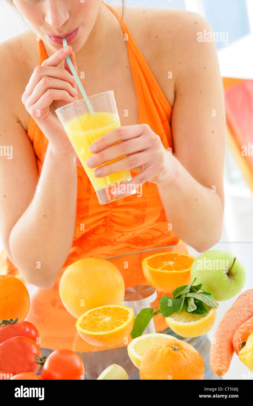 WOMAN WITH COLD DRINK Stock Photo - Alamy