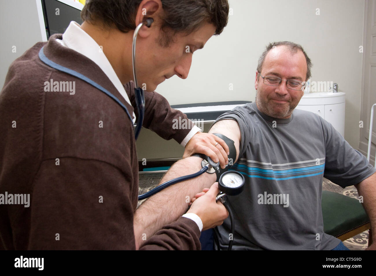 BLOOD PRESSURE, ELDERLY PERSON Stock Photo - Alamy