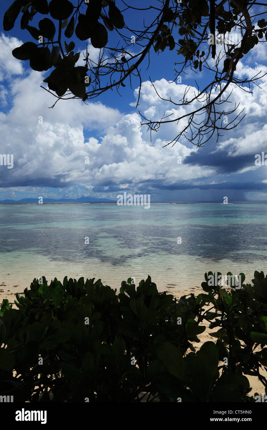 Storm clouds over Mahe as seen from La Digue in the Seychelles Stock ...
