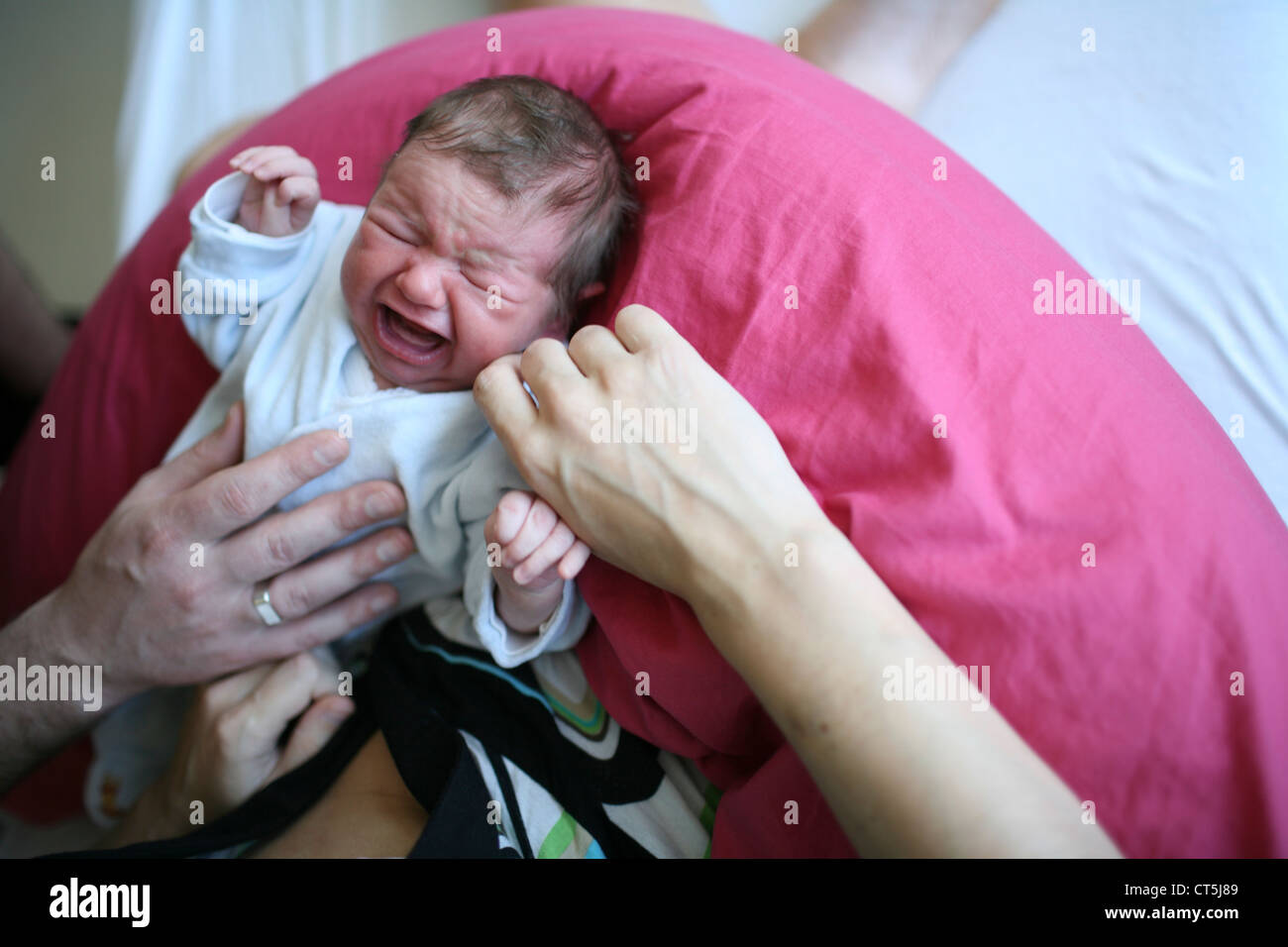 CRYING NEWBORN BABY Stock Photo - Alamy
