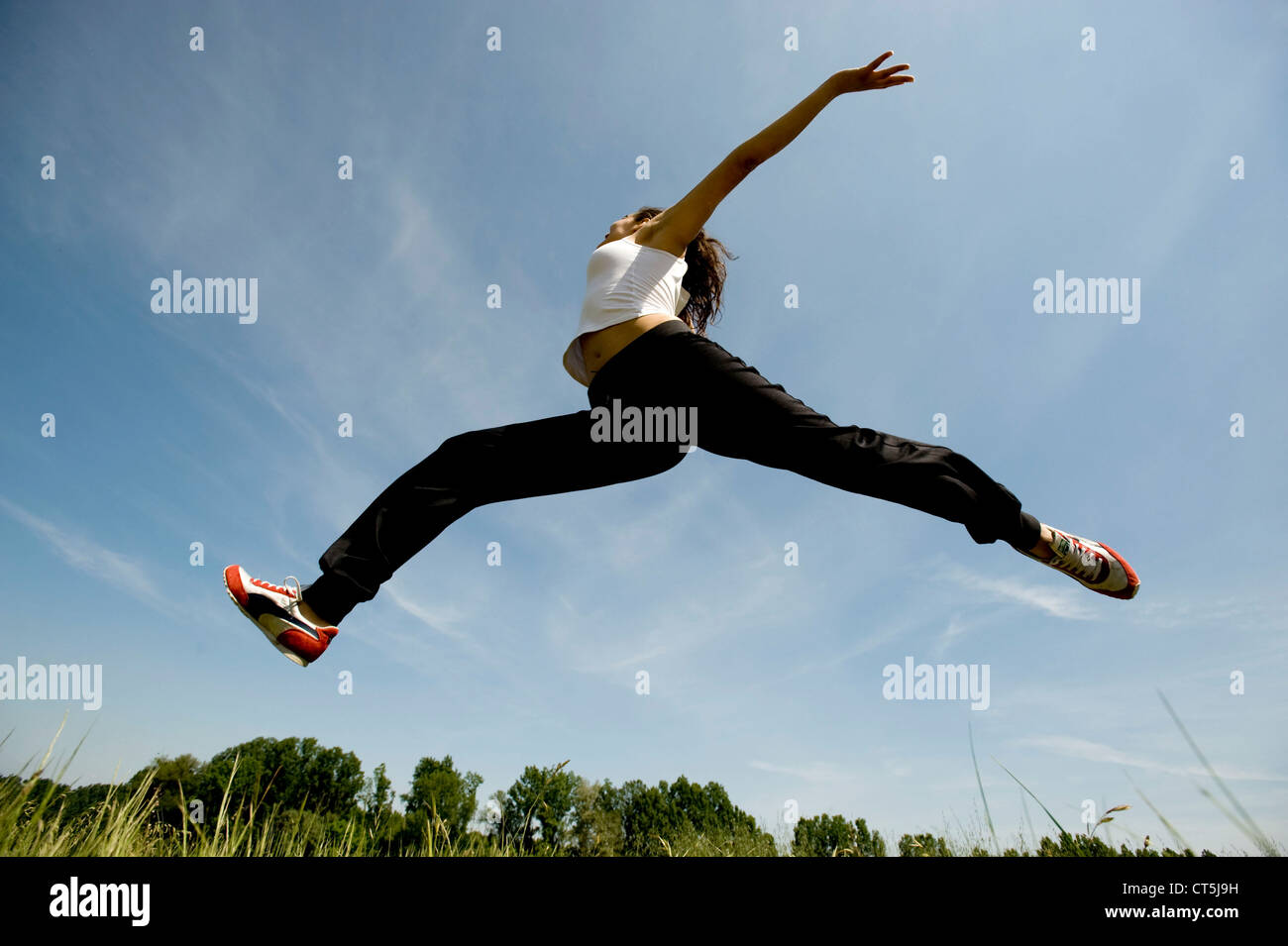 Mature woman hopping air hi-res stock photography and images - Alamy