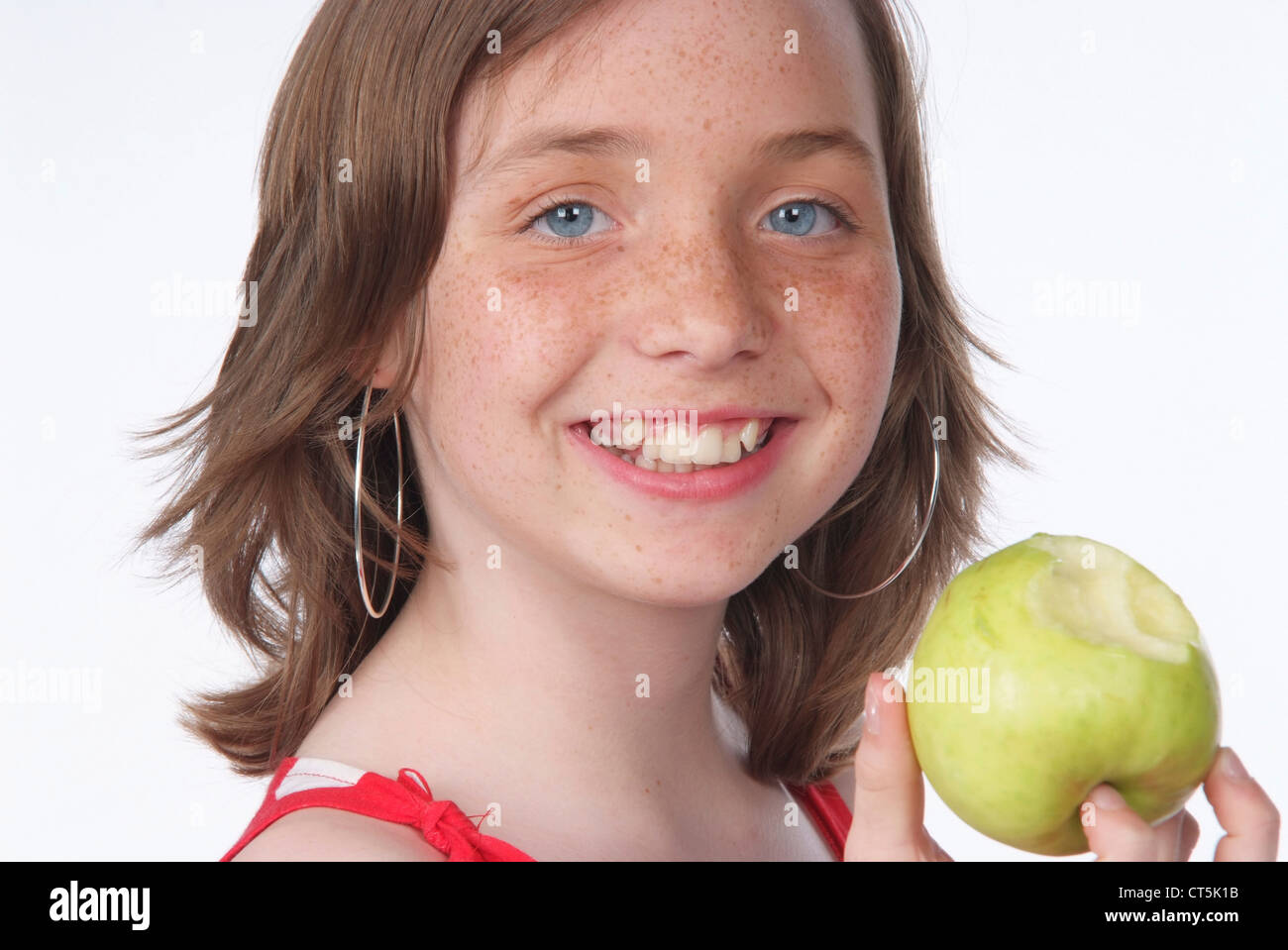 ADOLESCENT EATING FRUIT Stock Photo - Alamy