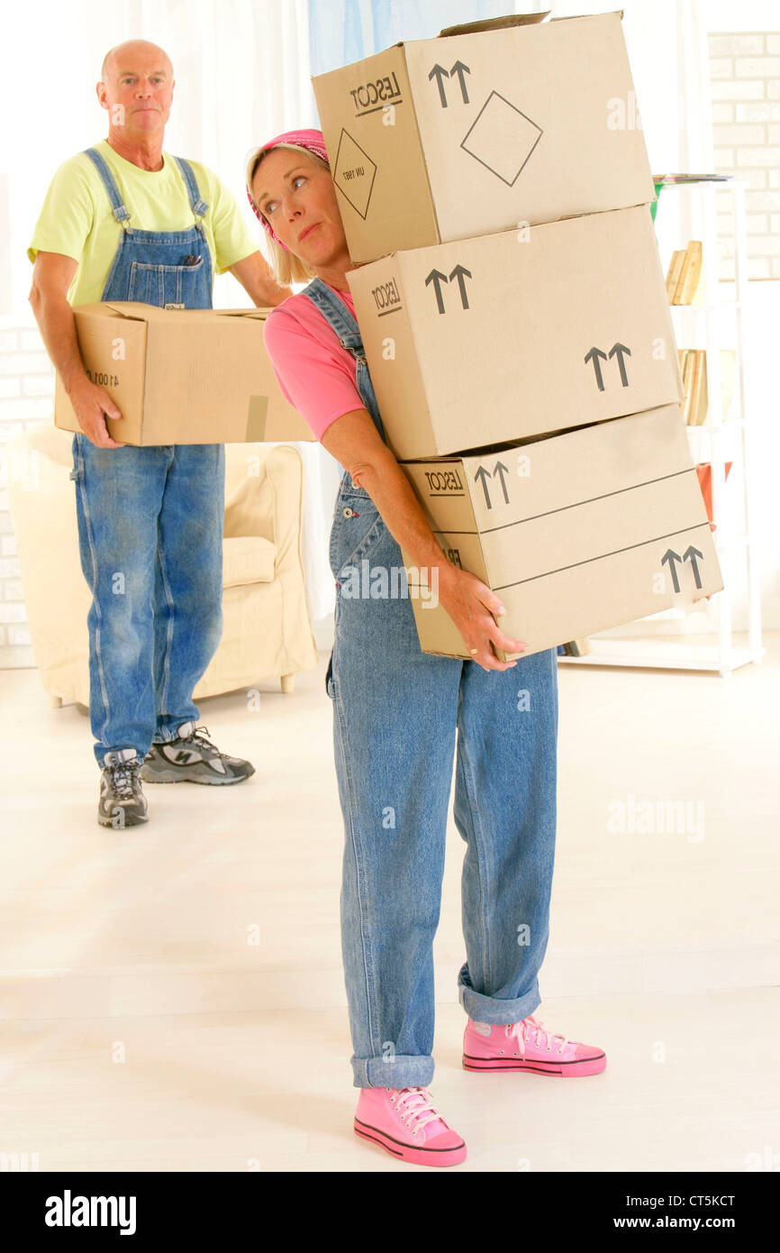 Senior lady moving home hi-res stock photography and images - Alamy