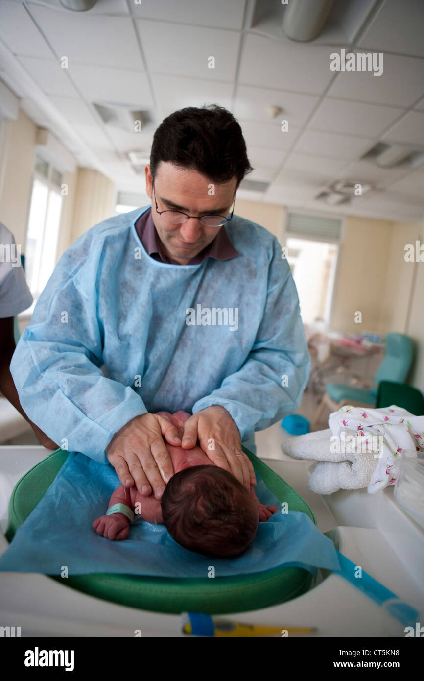 NEWBORN BABY BEING MASSAGED Stock Photo - Alamy
