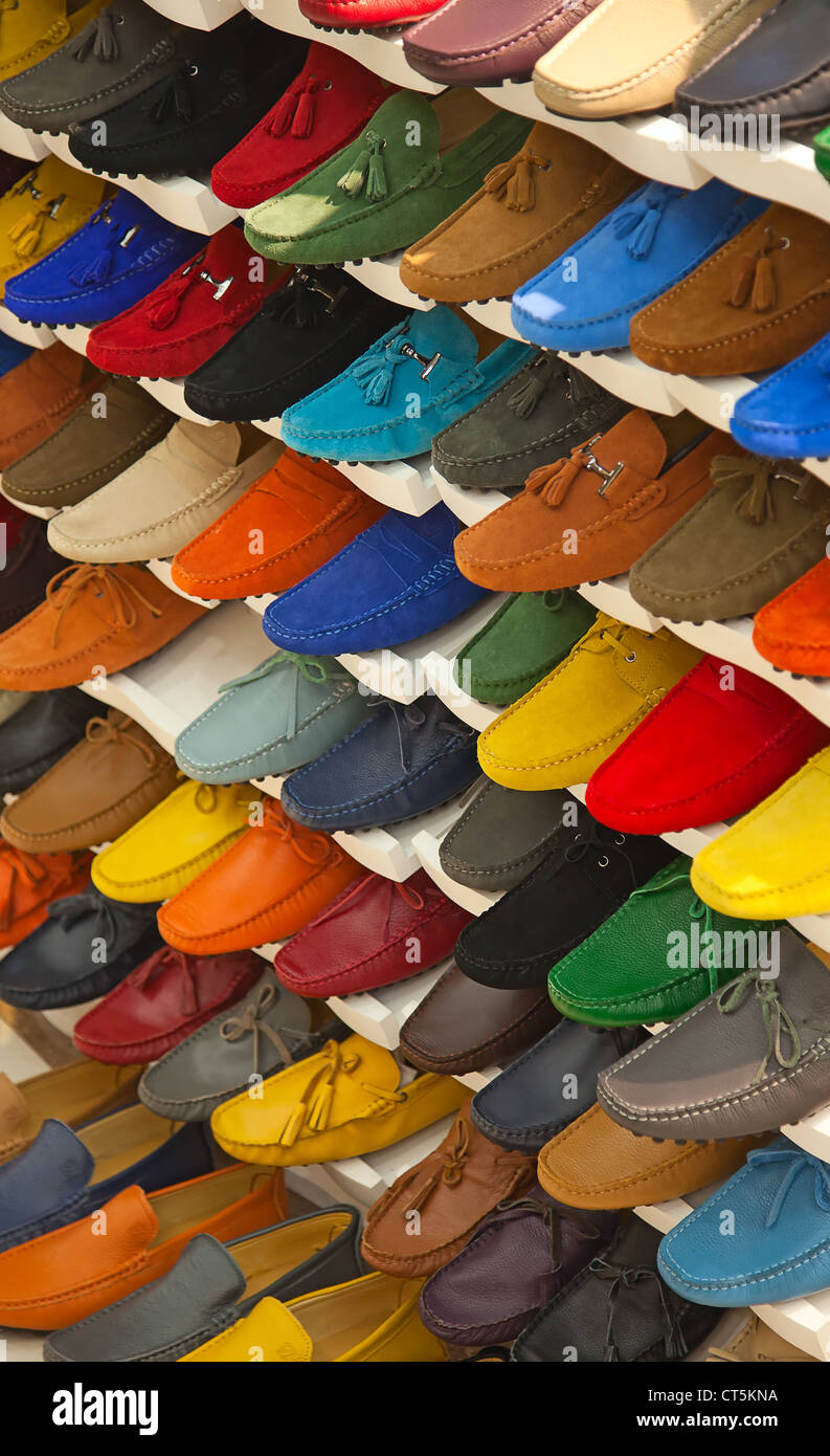 variety of the colorful leather shoes in the shop Stock Photo - Alamy