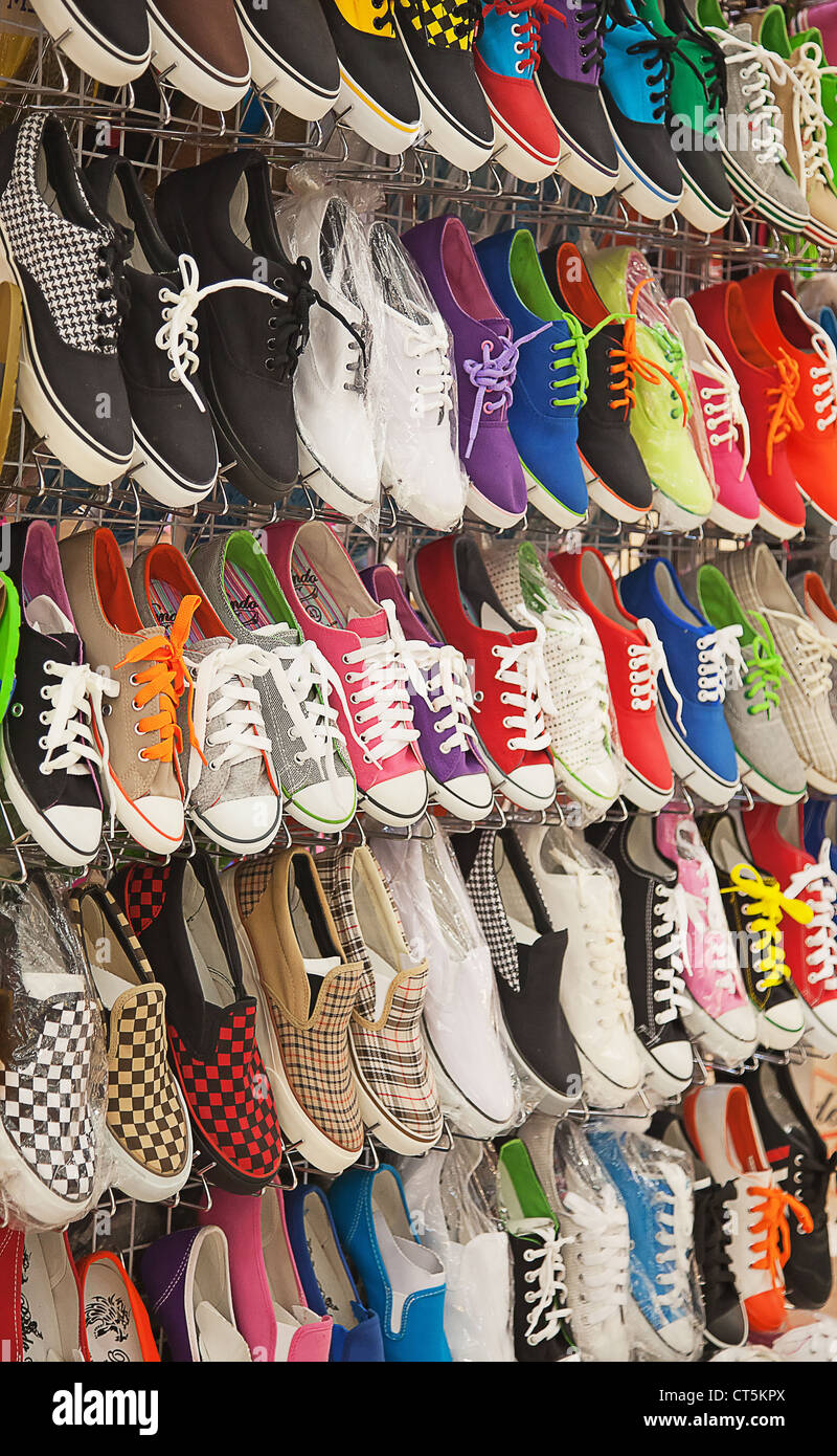 variety of the colorful leather shoes in the shop Stock Photo - Alamy