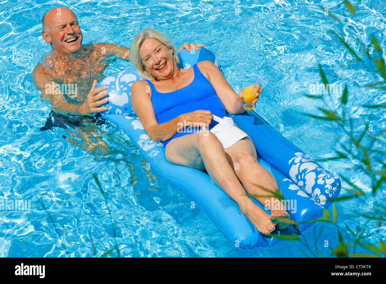 ELDERLY PERSON, SWIMMING POOL Stock Photo - Alamy