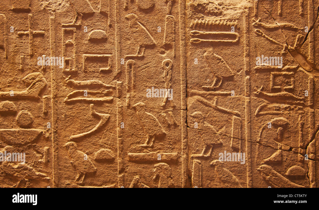 Egyptian hieroglyphs on the wall Stock Photo - Alamy