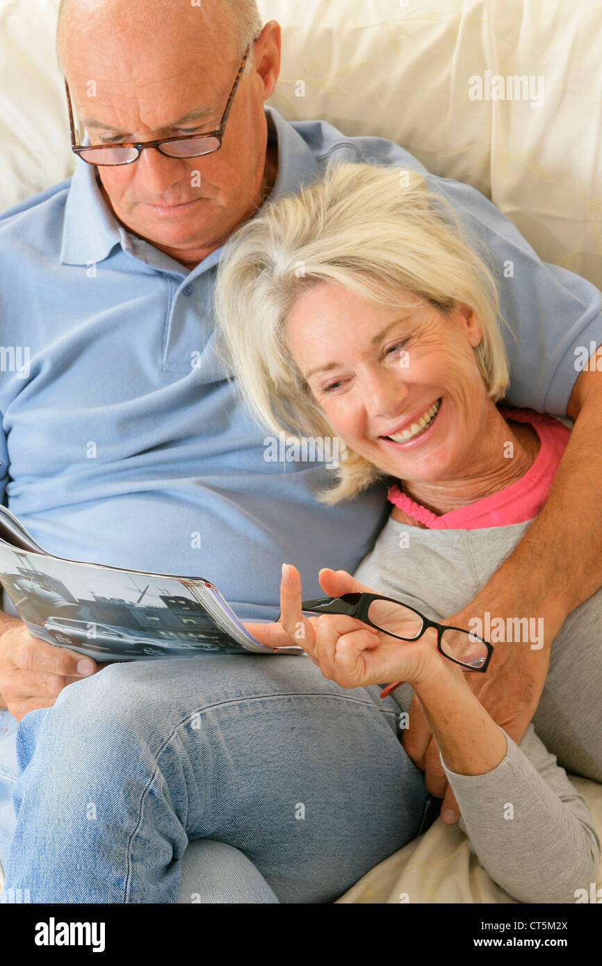 ELDERLY PERSON READING Stock Photo - Alamy