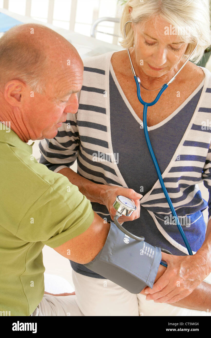 BLOOD PRESSURE, ELDERLY PERSON Stock Photo - Alamy