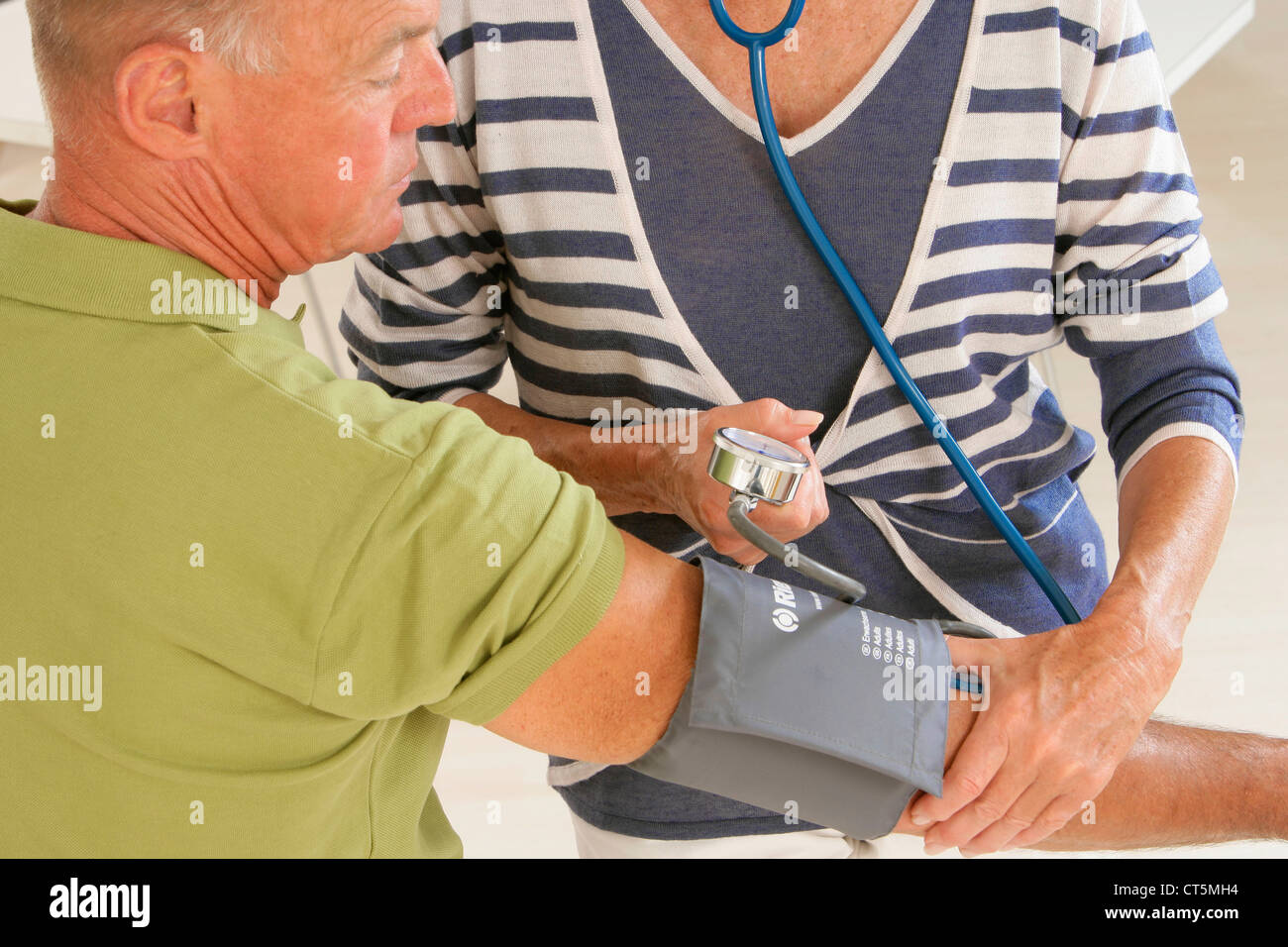 BLOOD PRESSURE, ELDERLY PERSON Stock Photo - Alamy