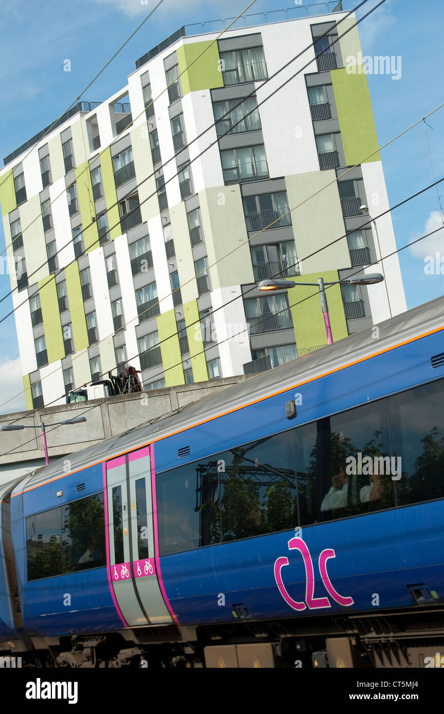 Close up of the carriage of a train in C2C livery waiting at a railway ...