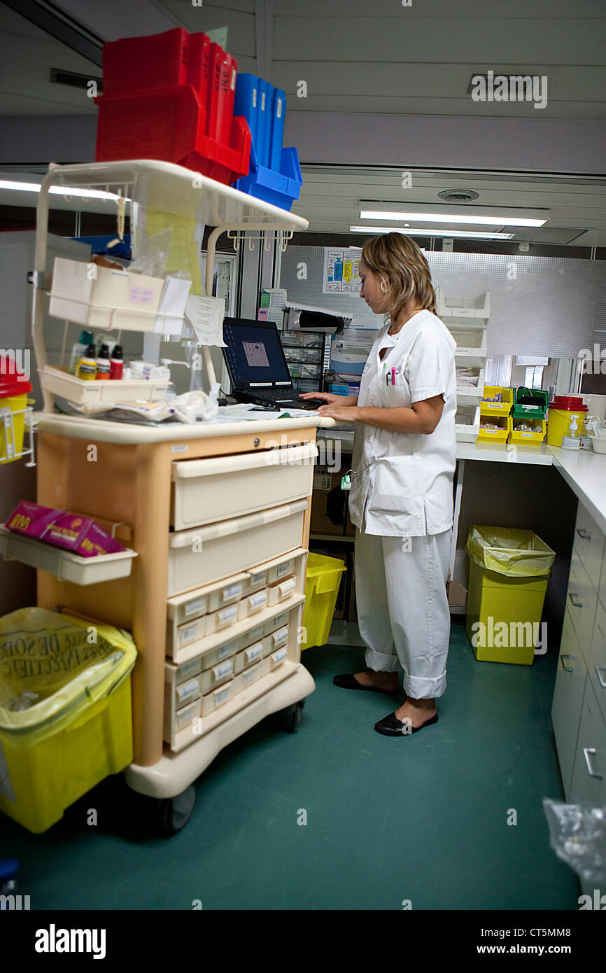 NURSE WITH PATIENT'S RECORD Stock Photo - Alamy