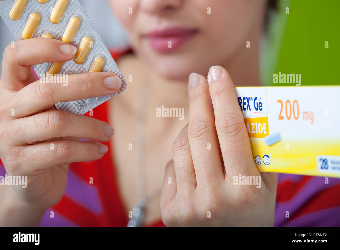 WOMAN TAKING GENERIC DRUG Stock Photo - Alamy