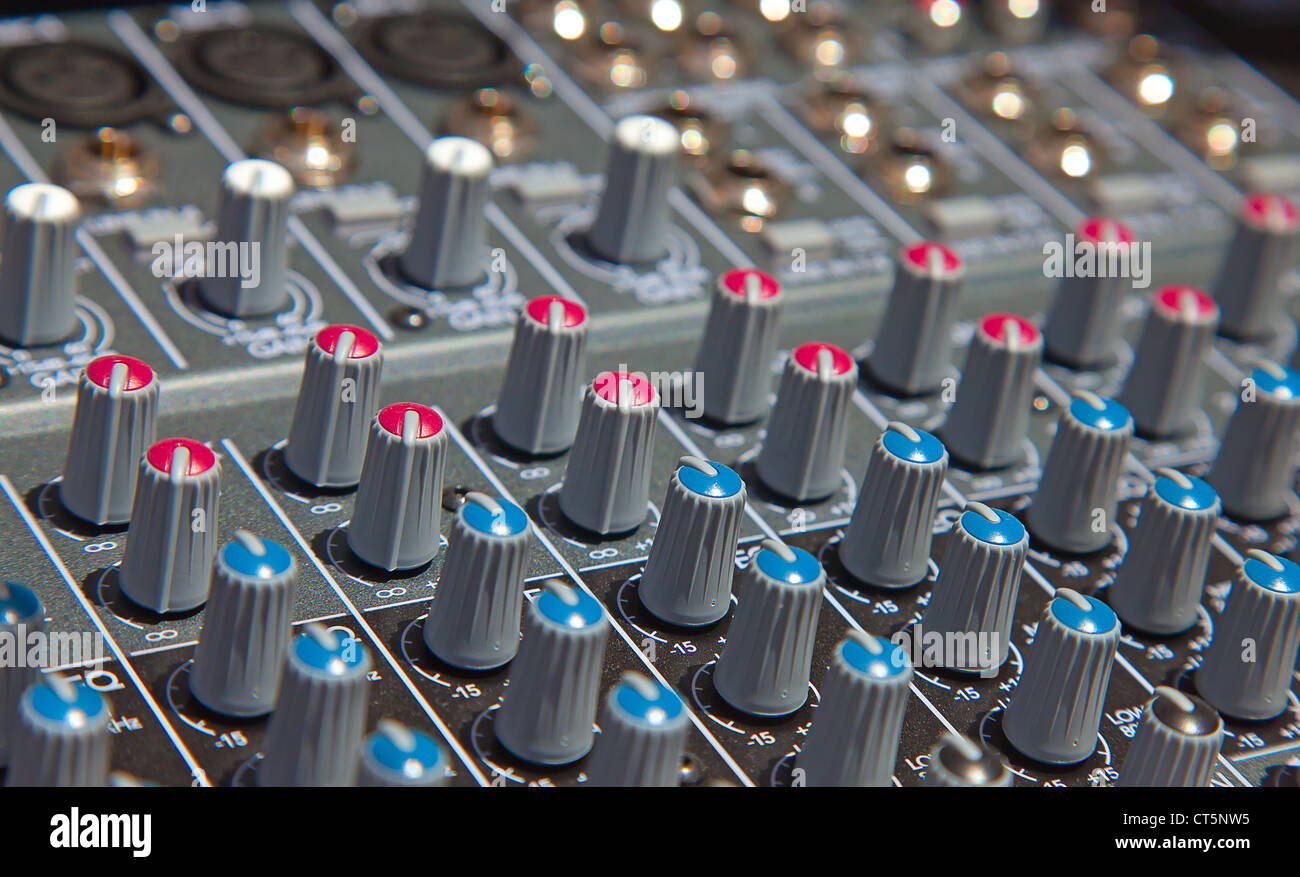 Part of an audio sound mixer with buttons Stock Photo - Alamy