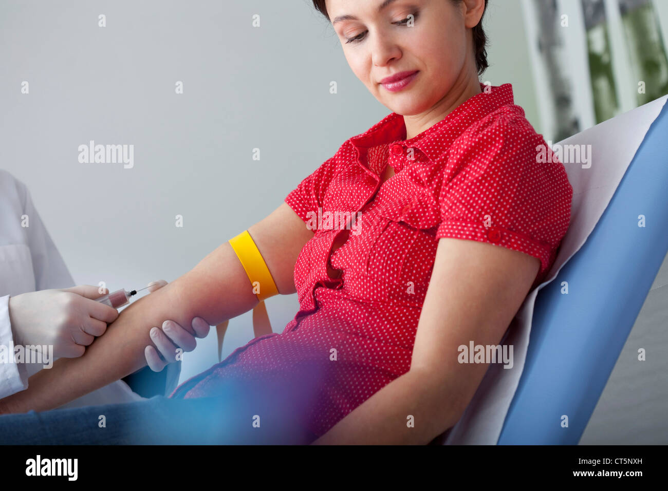 BLOOD SPECIMEN IN A WOMAN Stock Photo - Alamy
