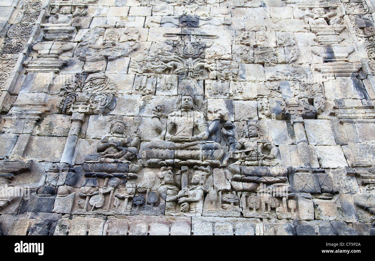 Traditional hindu motifs on the wall of balinese temple Stock Photo - Alamy
