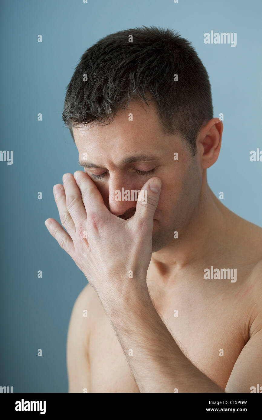 MAN WITH EYE PAIN Stock Photo - Alamy