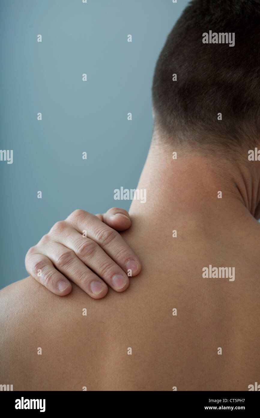 SHOULDER PAIN IN A MAN Stock Photo - Alamy