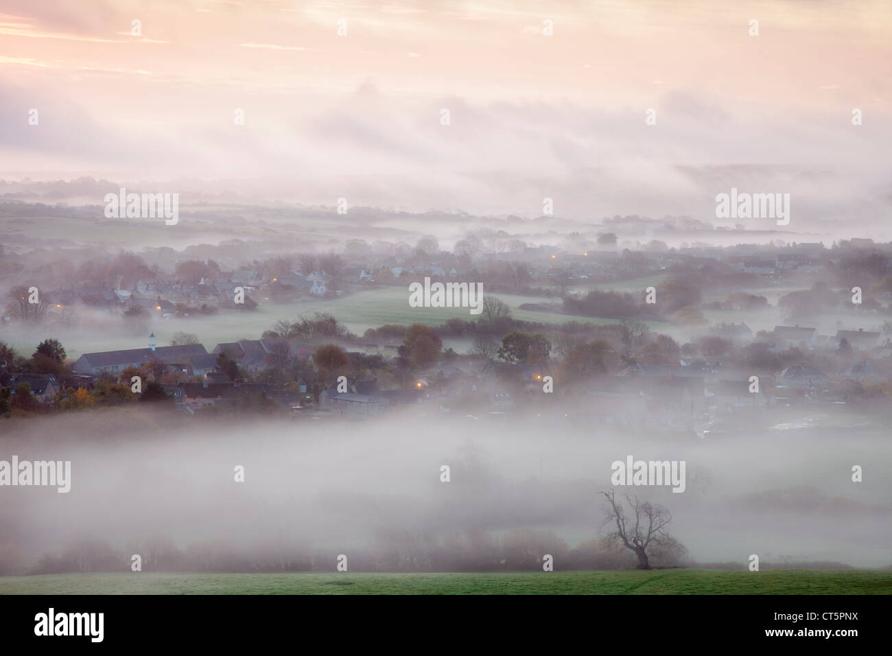Misty morning overlooking fields and countryside Stock Photo - Alamy