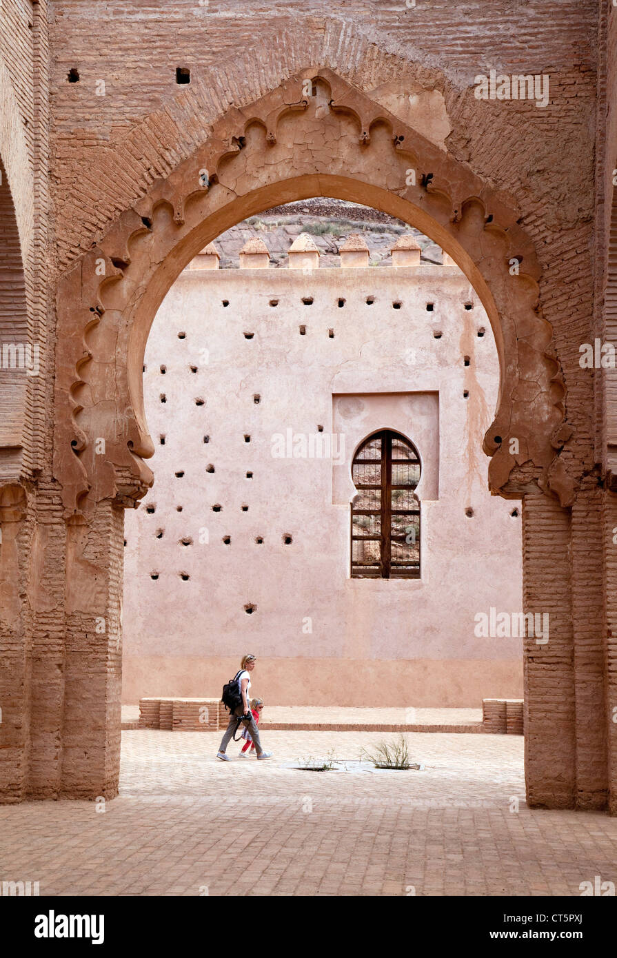 Tourists in the Islamic Mosque at Tin Mal, the high Atlas, Morocco ...