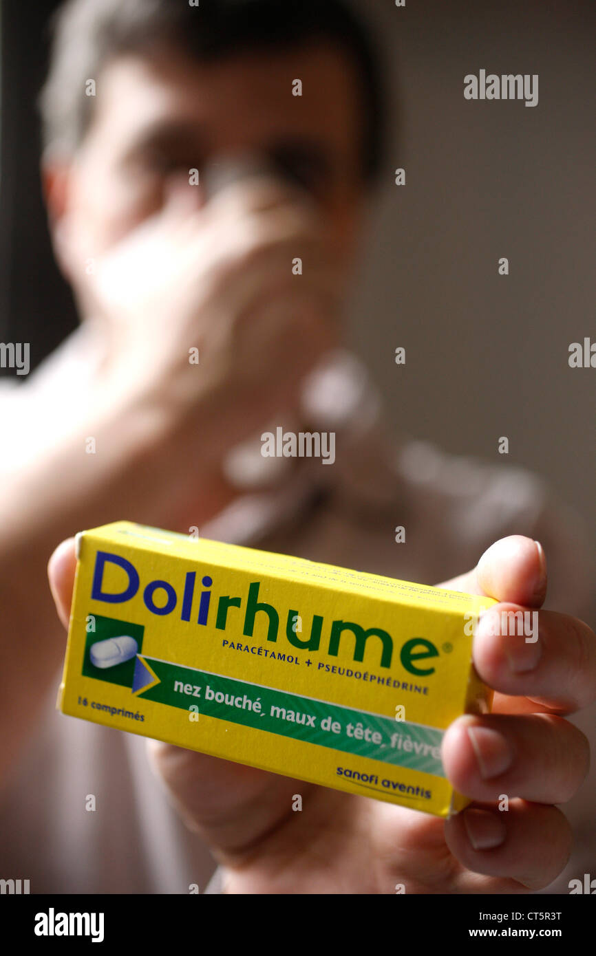 MAN WITH RHINITIS TREATMENT Stock Photo - Alamy