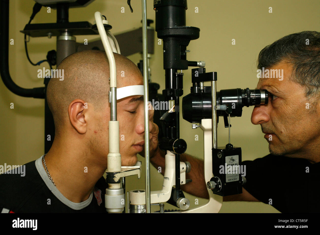 Male patient undergoes eye hi-res stock photography and images - Alamy