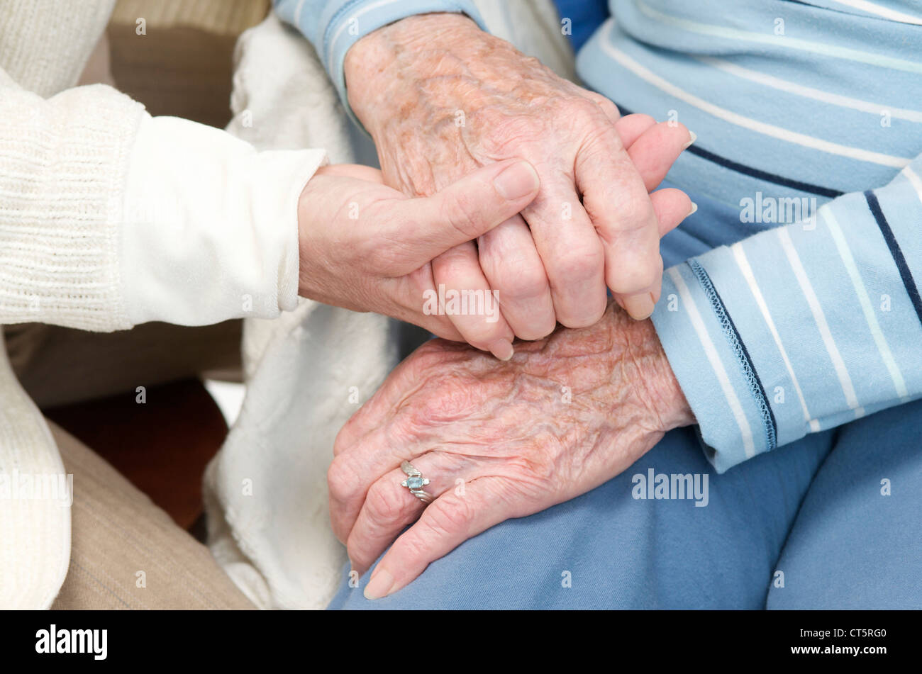 Adult daughters elderly mother caring hi-res stock photography and ...